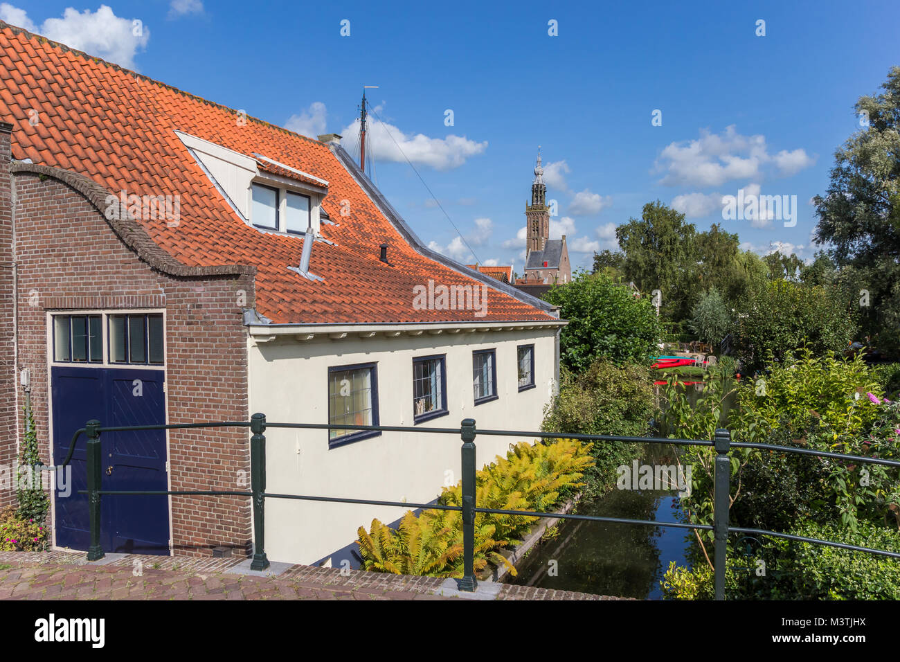 Old house at a canal in Edam, Netherlands Stock Photo - Alamy