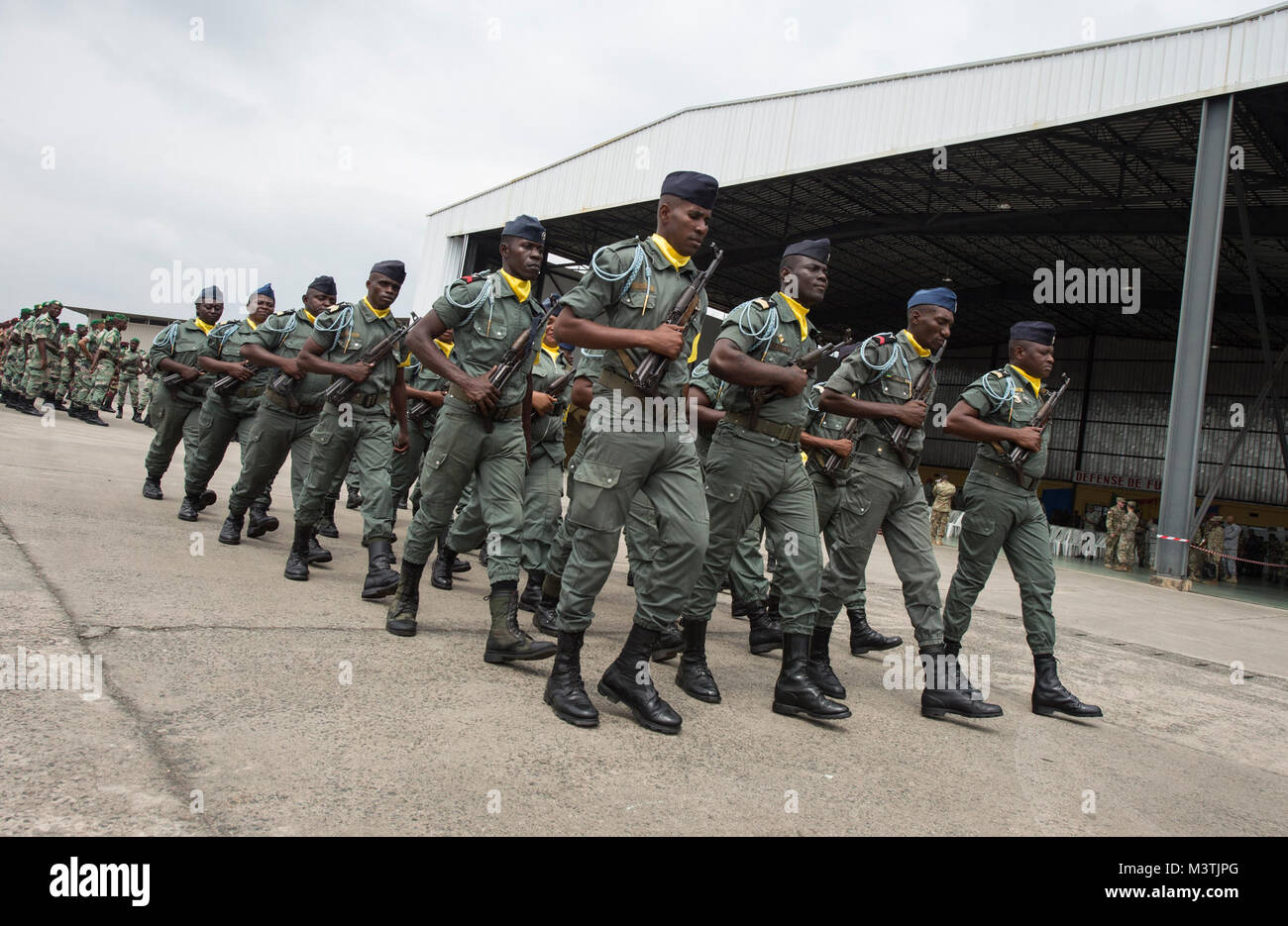 Military members of the Gabonese Armed Forces march during the opening ...