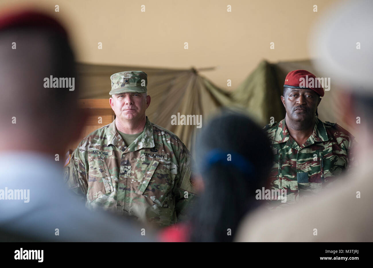 U.S. Army Brig. Gen. Kenneth Moore Jr. (left), Deputy Commander U.S ...