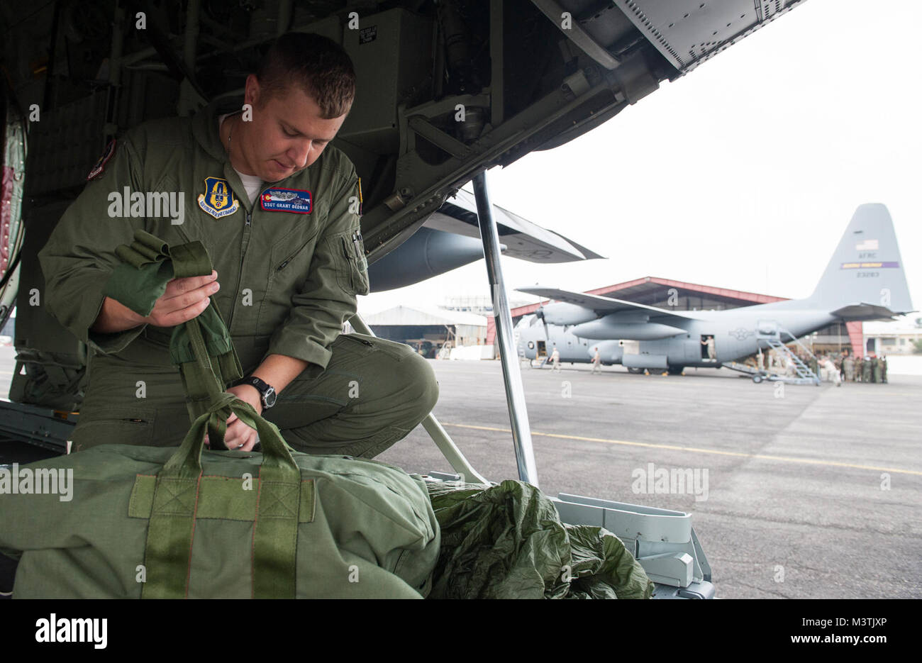 U.S. Air Force Reserve Staff Sgt. Grant Bednar, a loadmaster with the ...