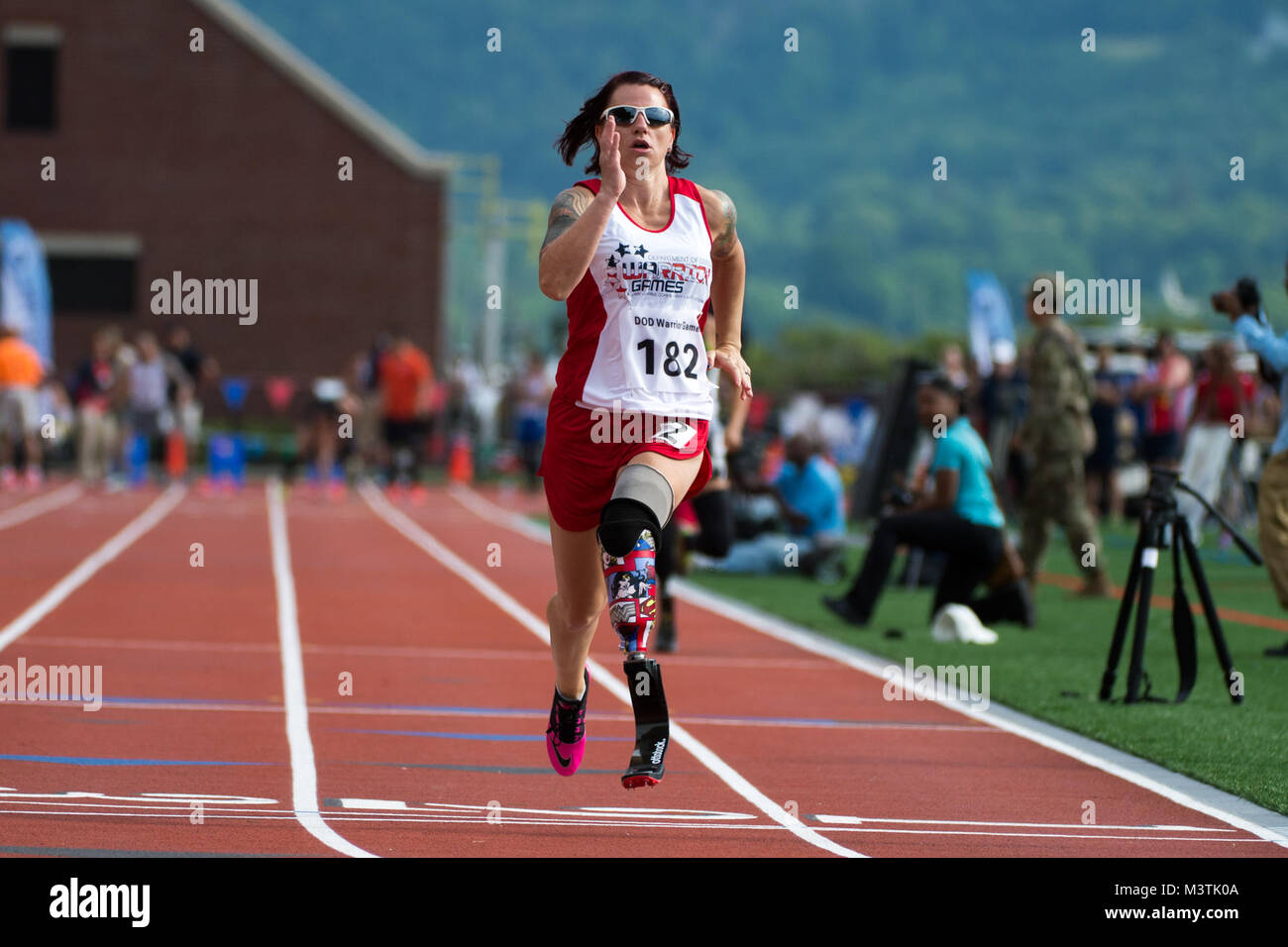 Marine Corps veteran Lance Cpl. Sarah Rudder finishes first in the 100 ...