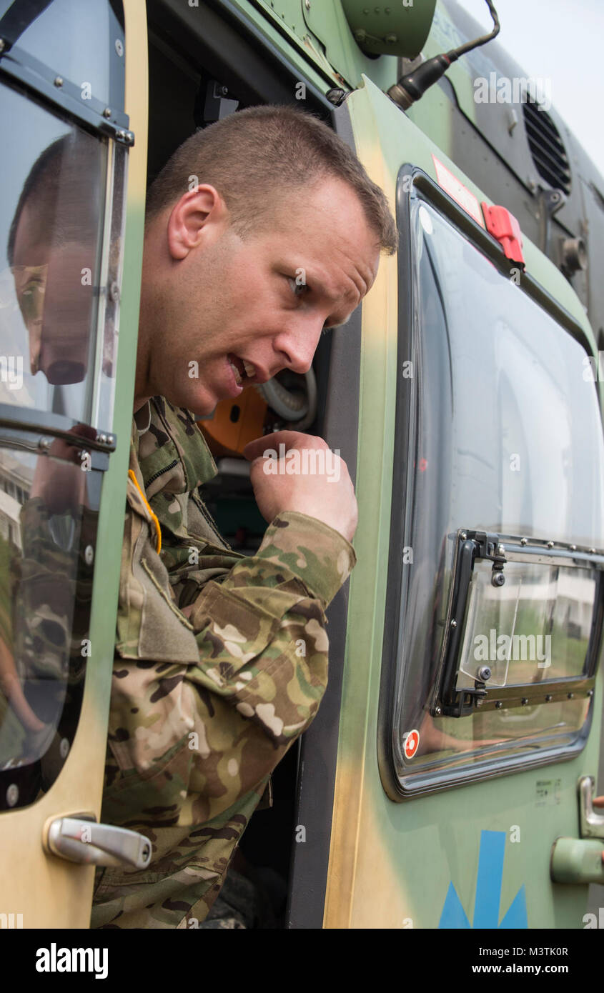 U.S. Army MAJ. Jeffrey Sills, an aeromedical evacuation officer ...