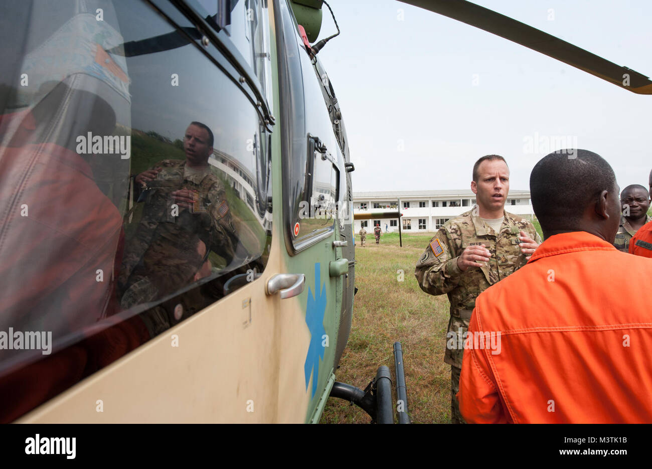 U.S. Army Major Jeffrey Sills, an aeromedical evacuation officer, goes ...