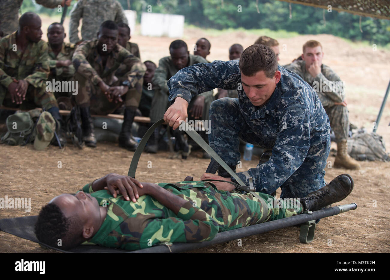 U.S. Navy HM3 Jared, Rittenhouse, a hospital corpsman with the Defense ...
