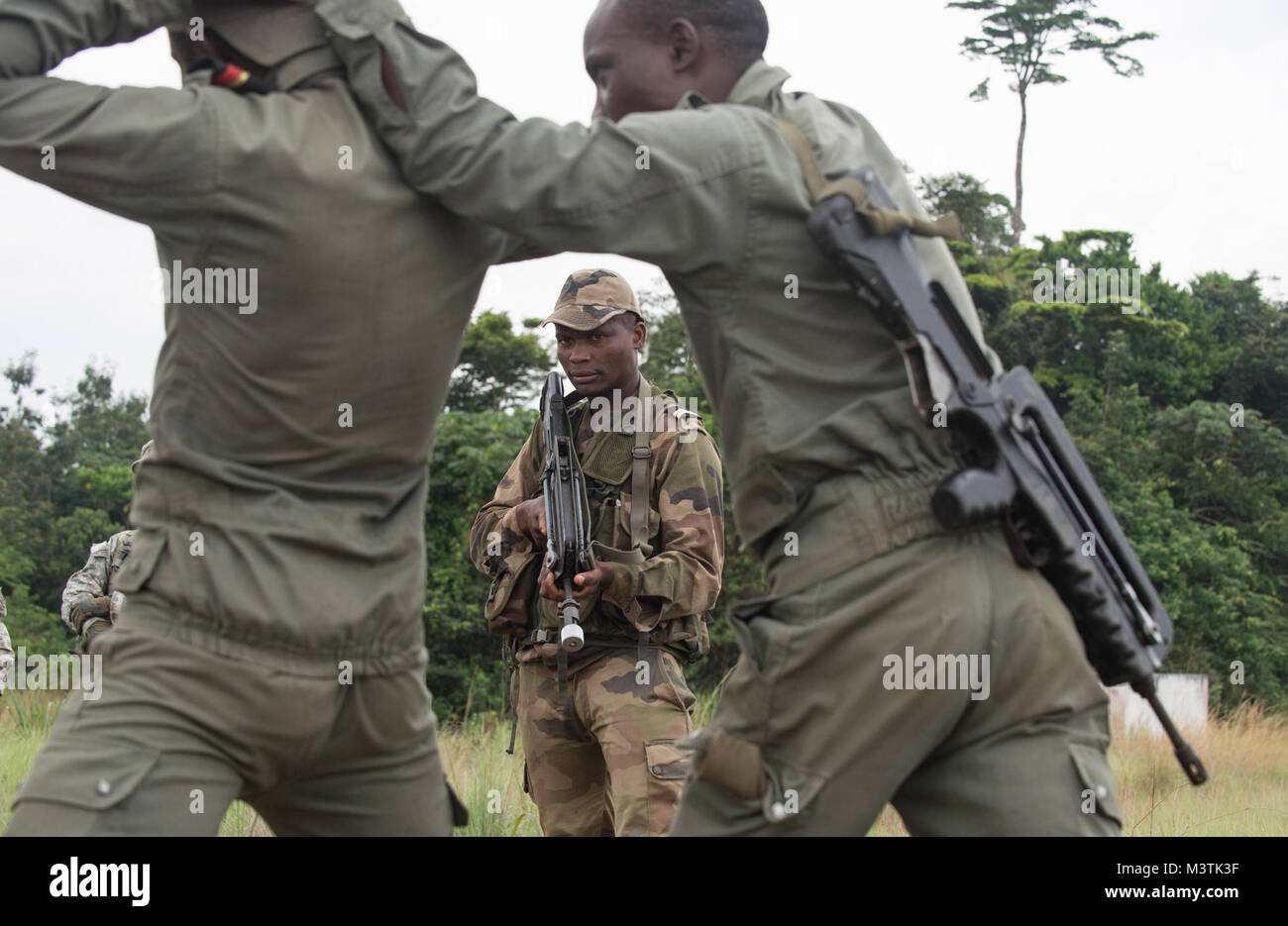 Members of the Gabonese Armed Forces rehearse the search and seizure of ...