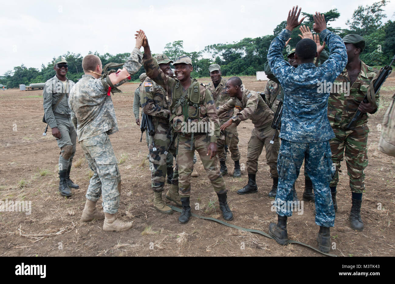 Gabonese Armed Force’s Soldiers cheer alongside U.S. Military members ...