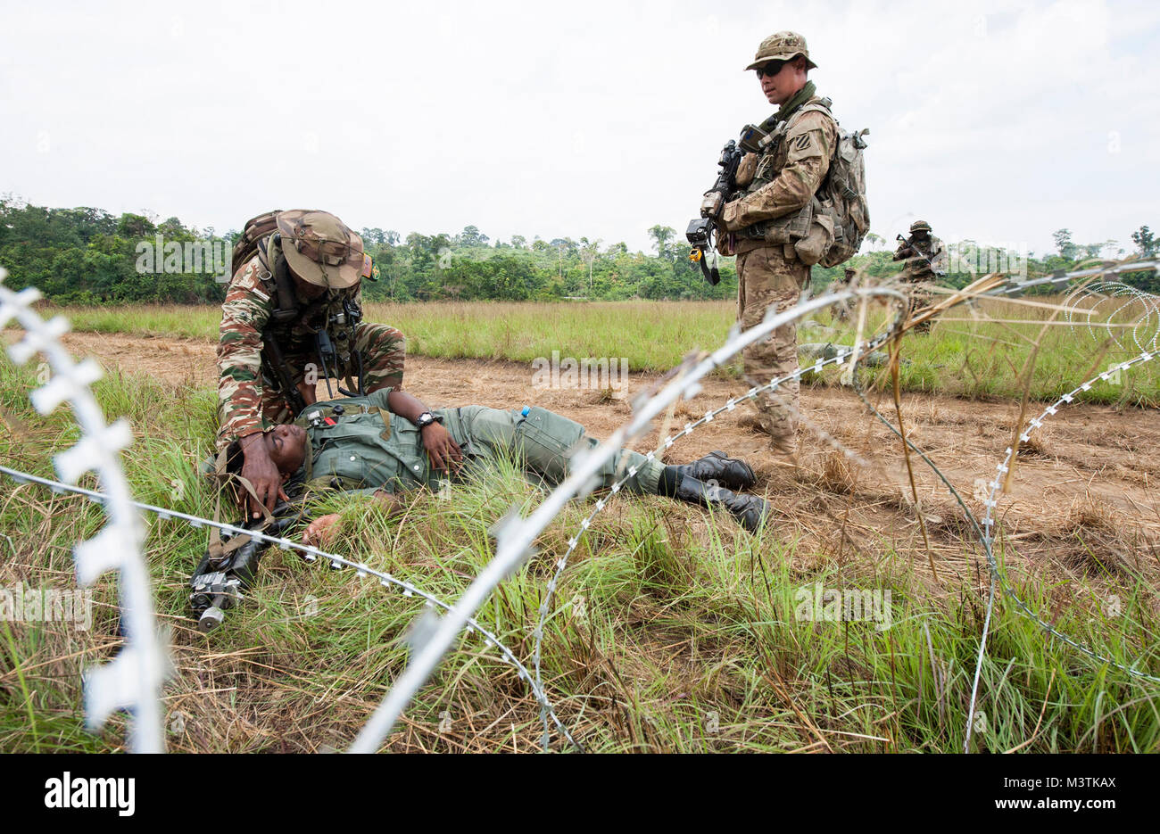 An U.S. Army infantryman (right) and a Cameroonian Armed Forces Soldier ...