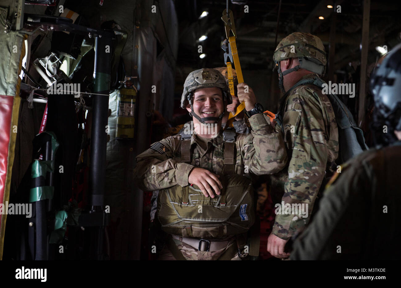 Paratroopers, with the 82nd Airborne Division, prepare to jump from a U ...