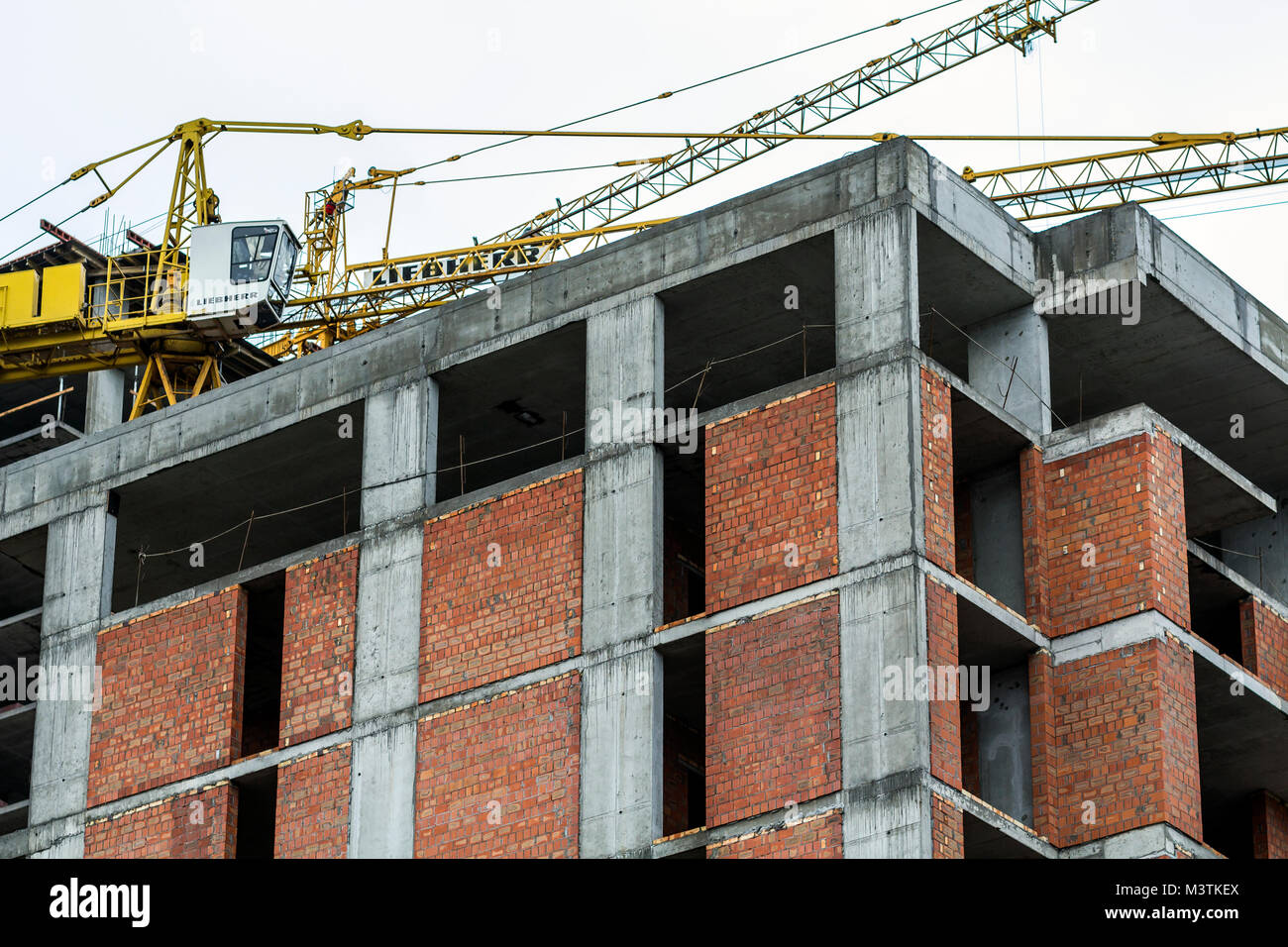 Ground view of a new modern residential house building under ...