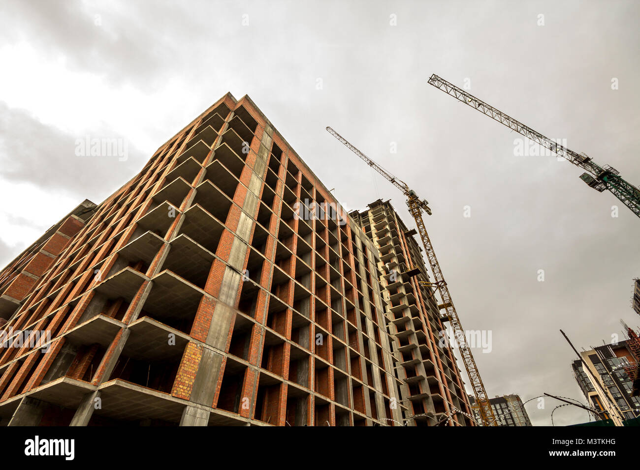 Ground view of a new modern residential house building under ...