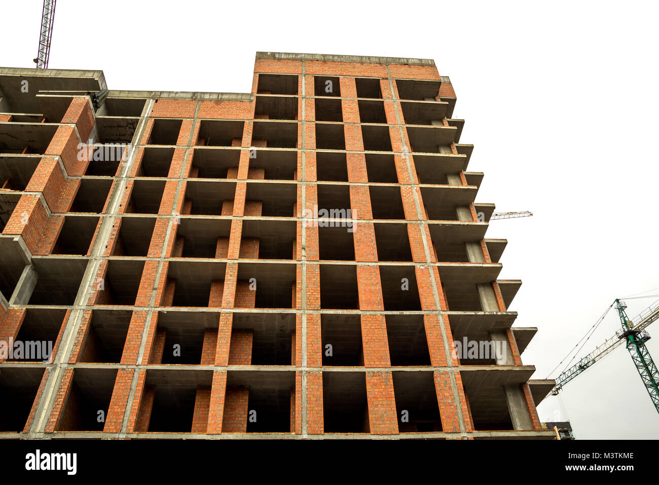 Ground view of a new modern residential house building under ...