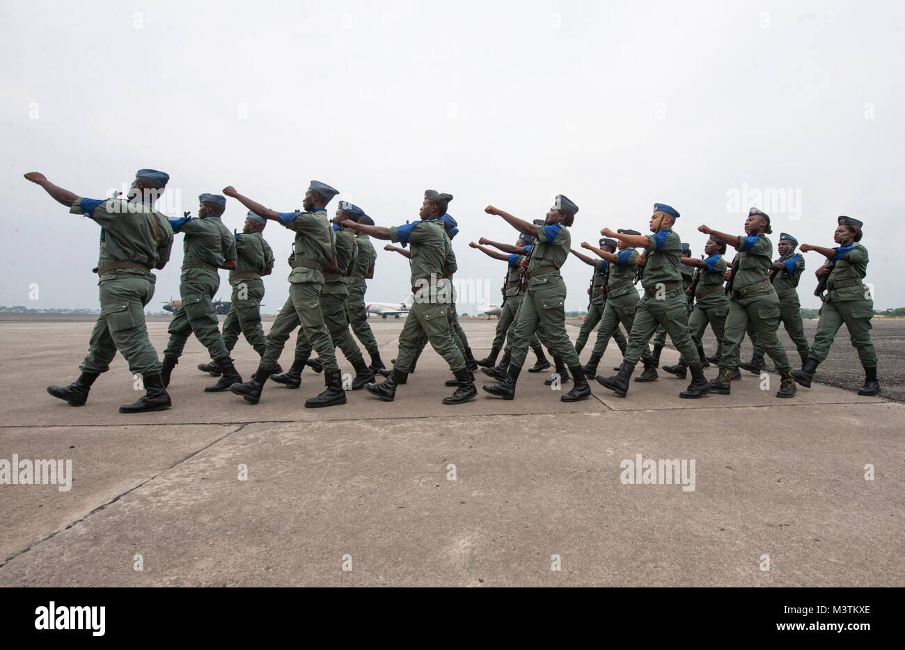 Gabonese Armed Force Soldiers march across a flight line during the ...
