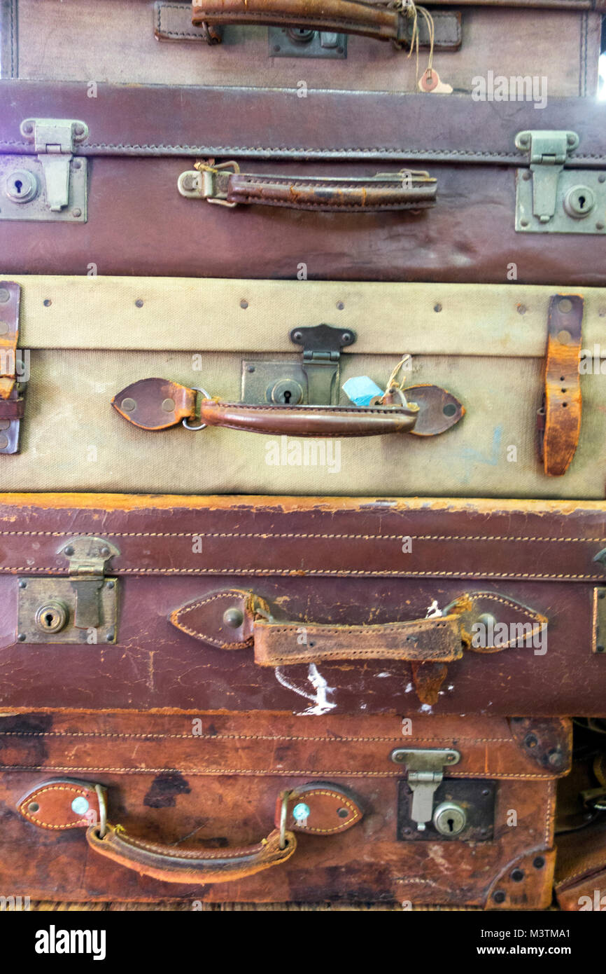 Vintage Used Travel Suitcases Stock Photo - Alamy