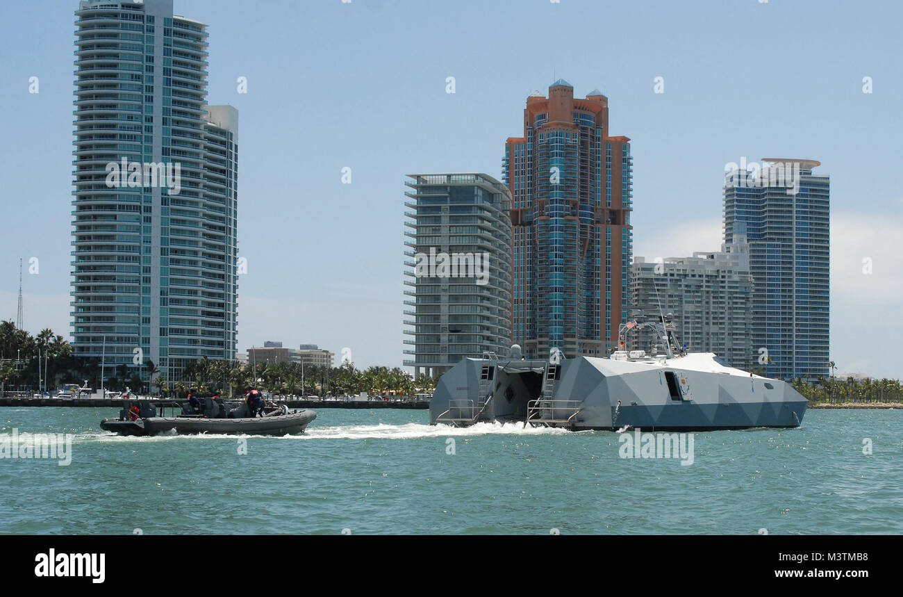 A U.S. Coast Guard Law Enforcement Detachment (LEDET) team exits the ...