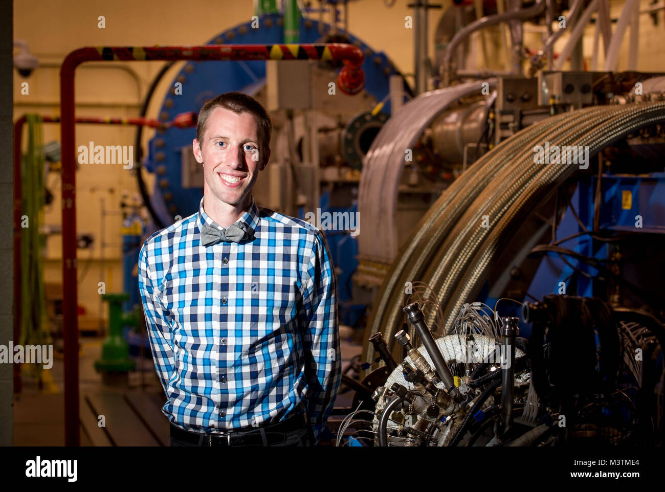 Ryan Helbach, a Hypersonic Research Engineer, stands in Hypersonic ...