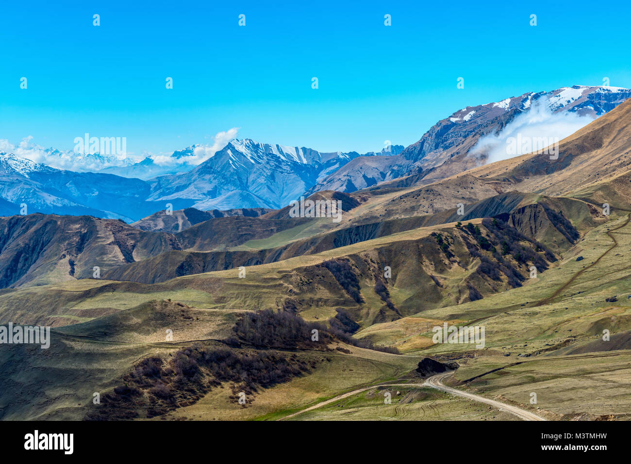 amazing view of spring day landscape Caucasus mountains with blue sky ...