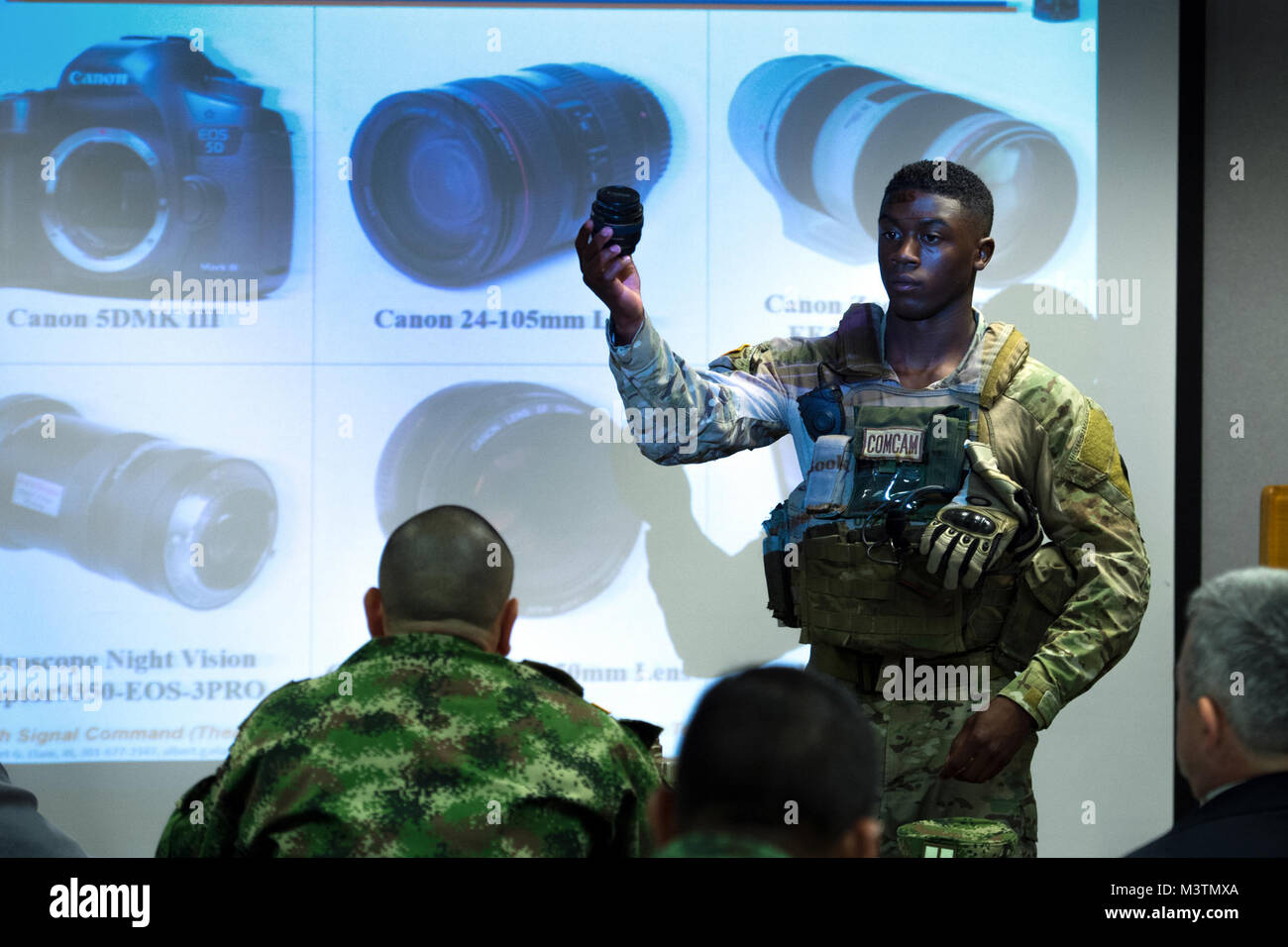 A military member attends a briefing during the North America ...