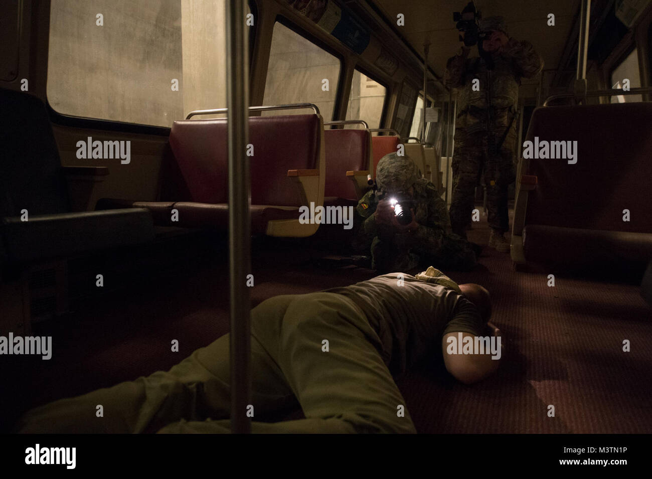 A combat camera team from Colombia and the United States document a ...