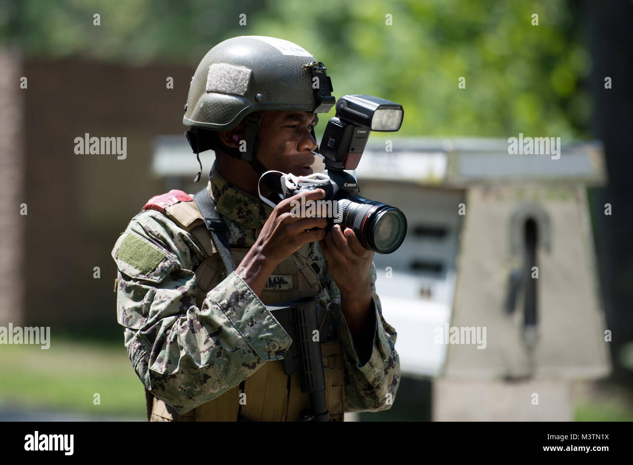 Royal Bahamas military photographer Stefan Anton McDonald looks for ...