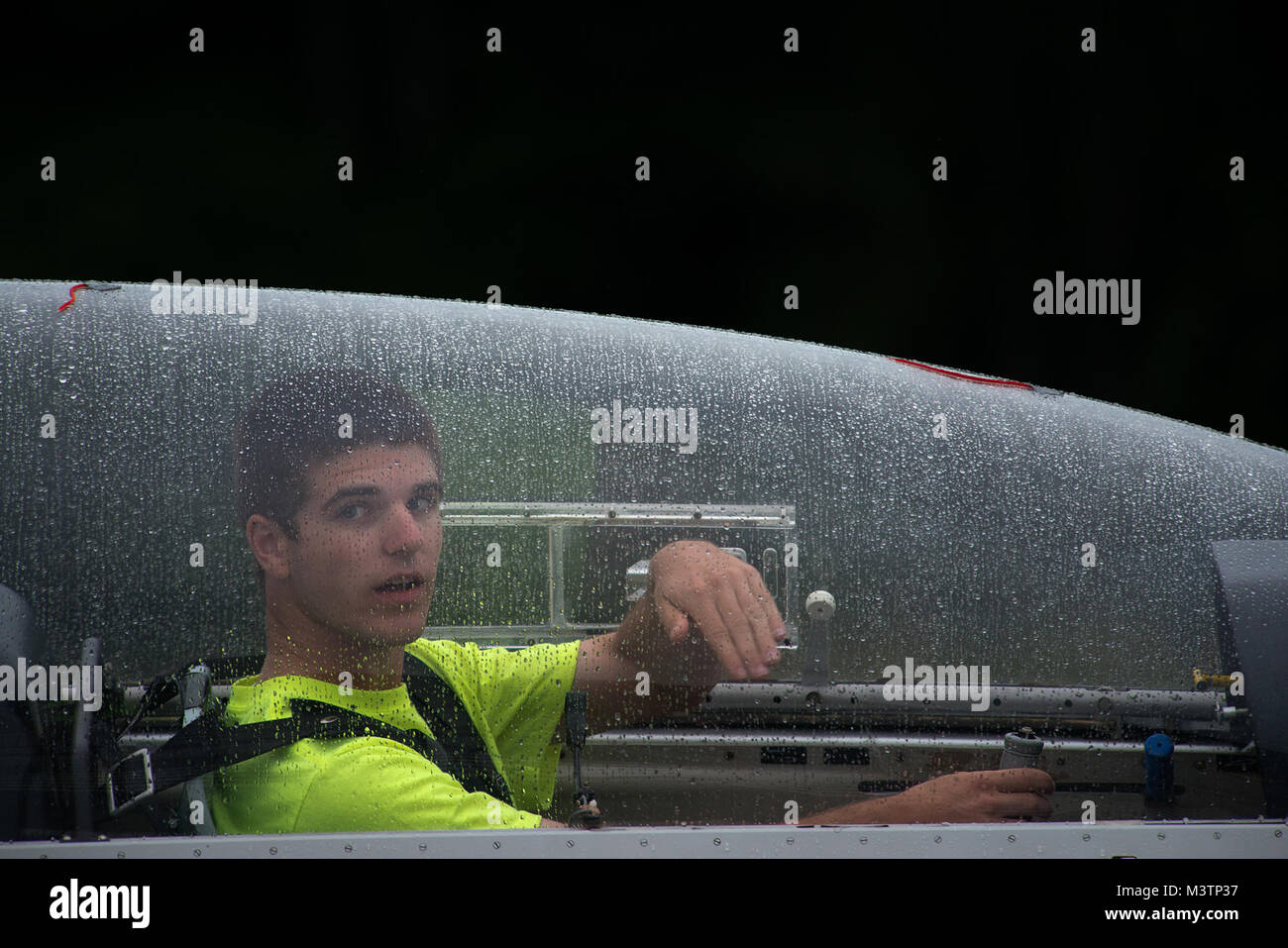 Civil Air Patrol cadet, Thomas Ray, signals to his wing-runner before a ...