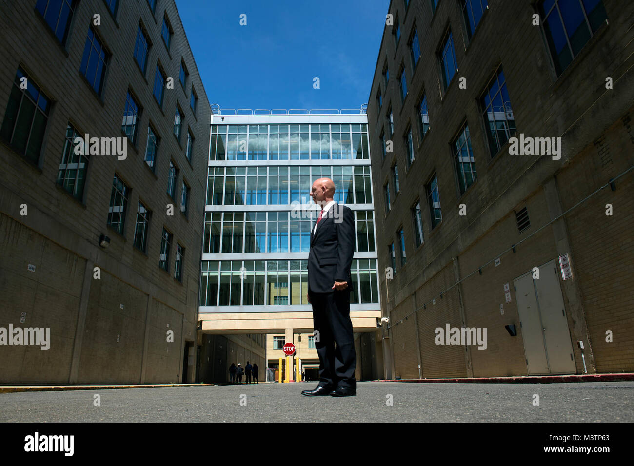 Retired Army Col. Franklin Childress stands between two rings of the ...