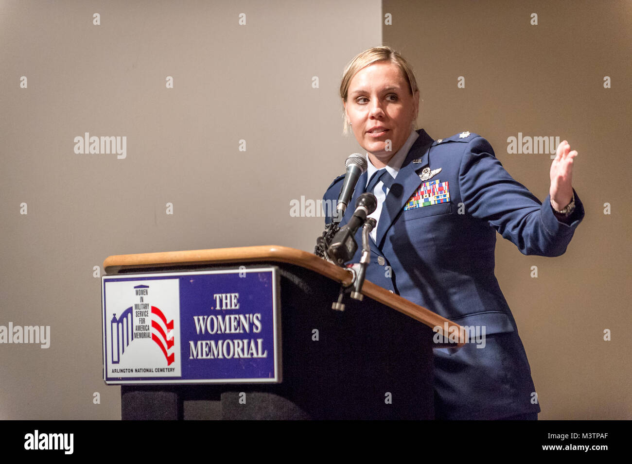 Lt. Col. Caroline Jensen, USAFR, makes remarks during a memorial ...