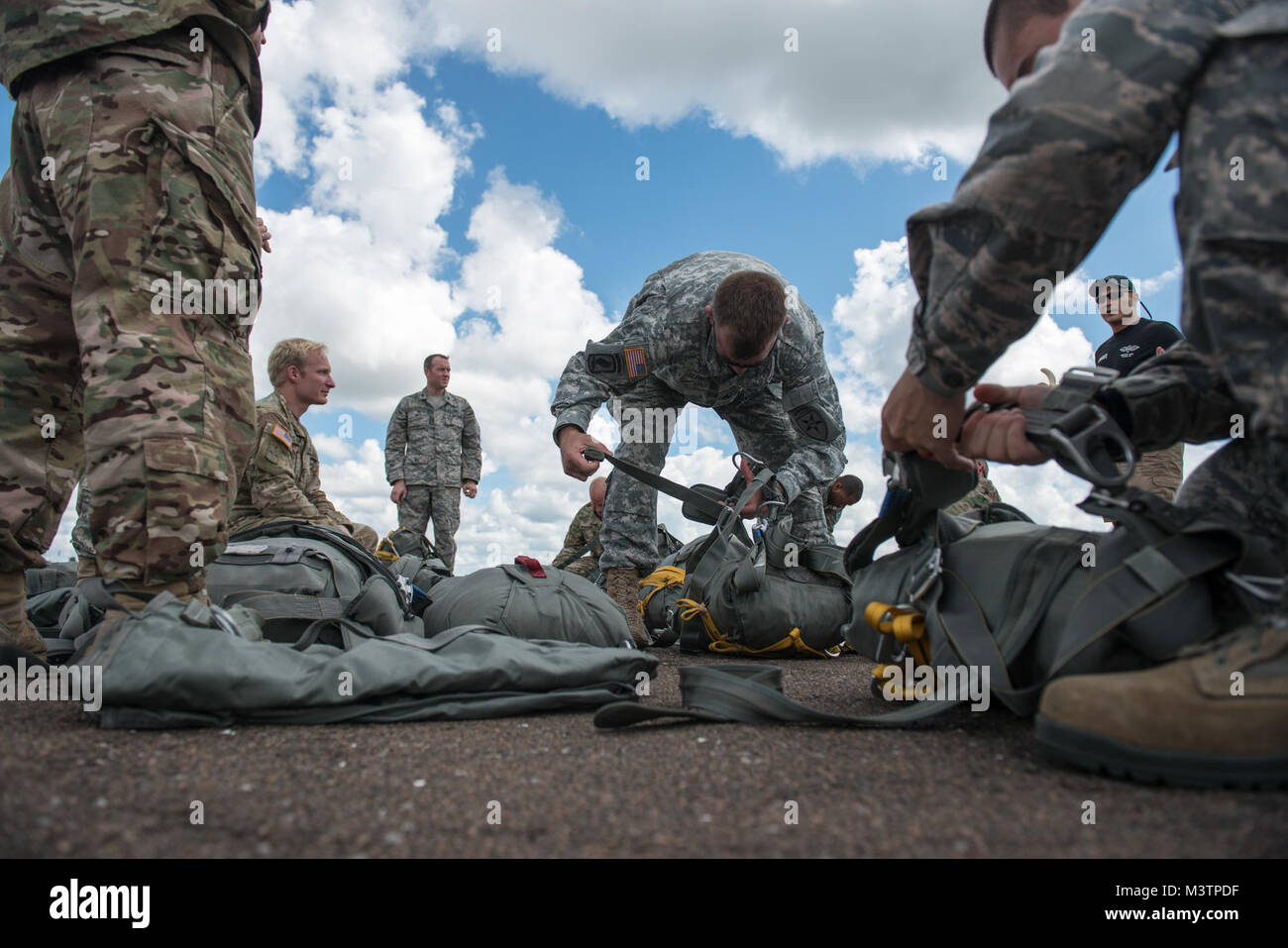 Joint Communication Support Element operators prepare their chutes ...