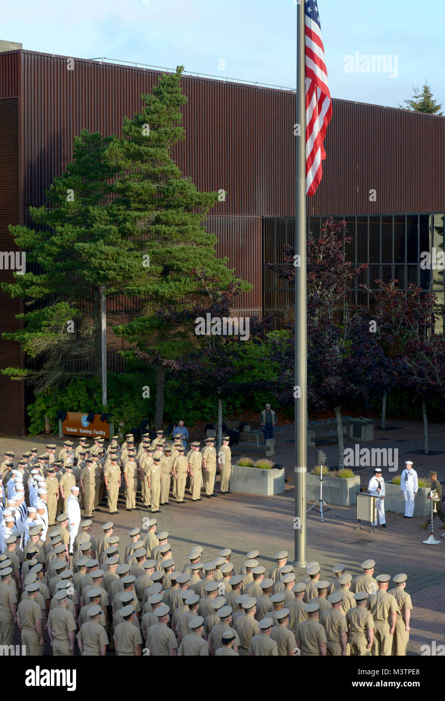 BANGOR, Wash. (Sept. 11, 2016) Sailors stand at attention as the ...