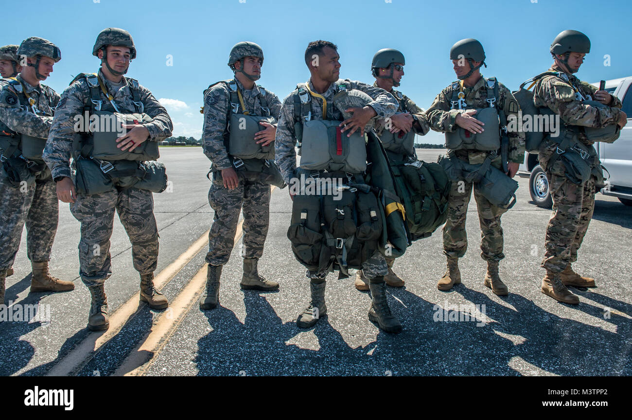 Joint Communication Support Element operators wait to board a C-130 ...