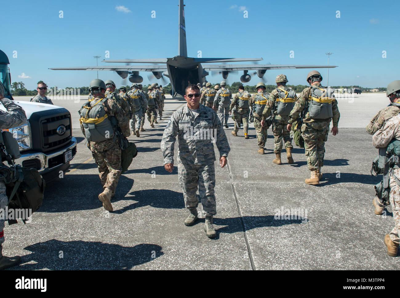 Joint Communication Support Element operators board a C-130 Hercules ...