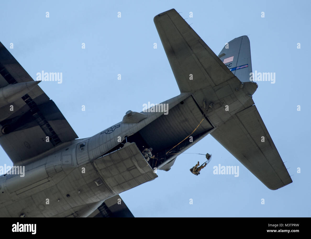 Joint Communication Support Element operators jump from a C-130 ...