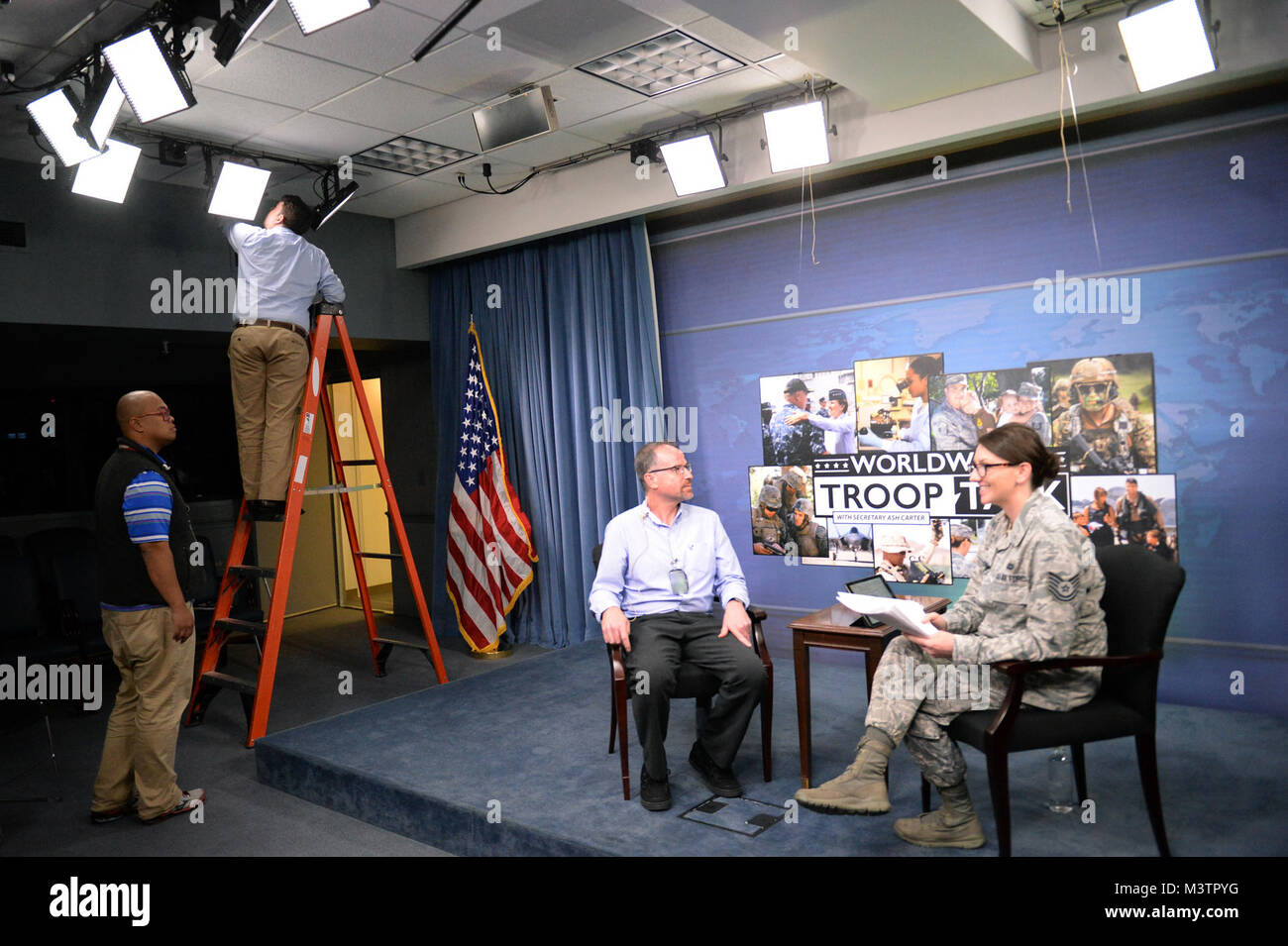 Mr. Tony McKinney, Pentagon Briefing Room Floor Director, directs ...