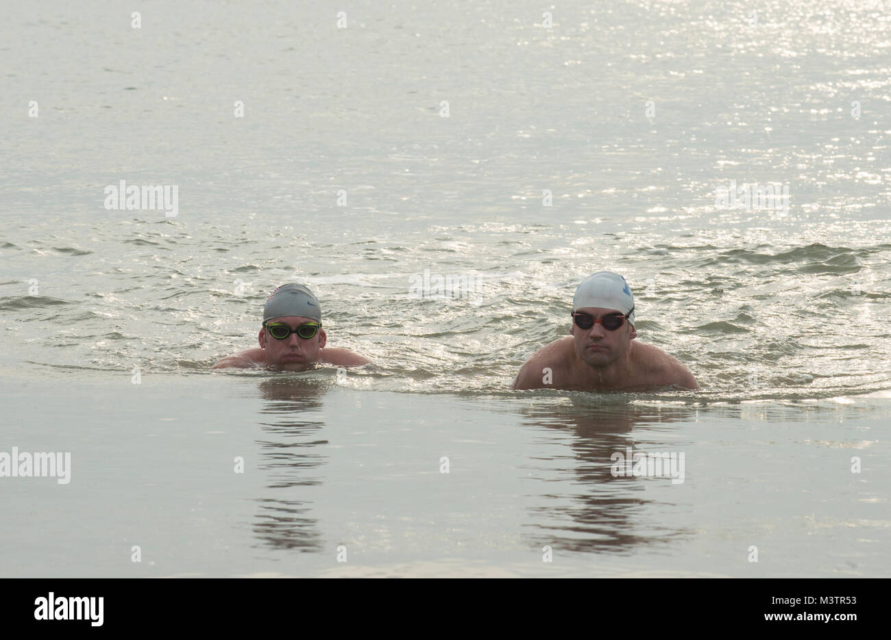 U.S. Air Force Major Casey Bowen (left) and U.S. Air Force Major Simon ...