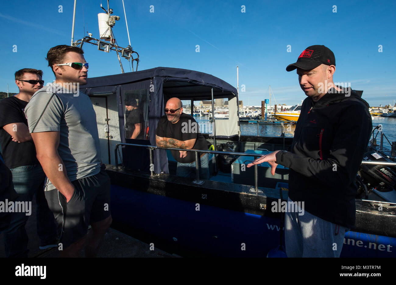U.S. Air Force Major Casey Bowen (left) and U.S. Air Force Major Simon ...