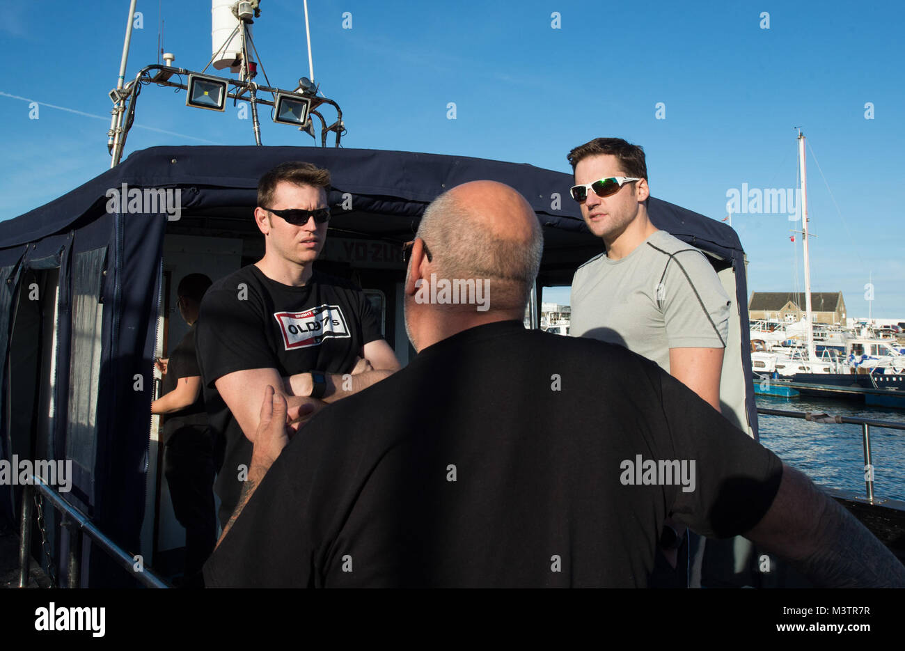 U.S. Air Force Major Casey Bowen (left) and U.S. Air Force Major Simon ...