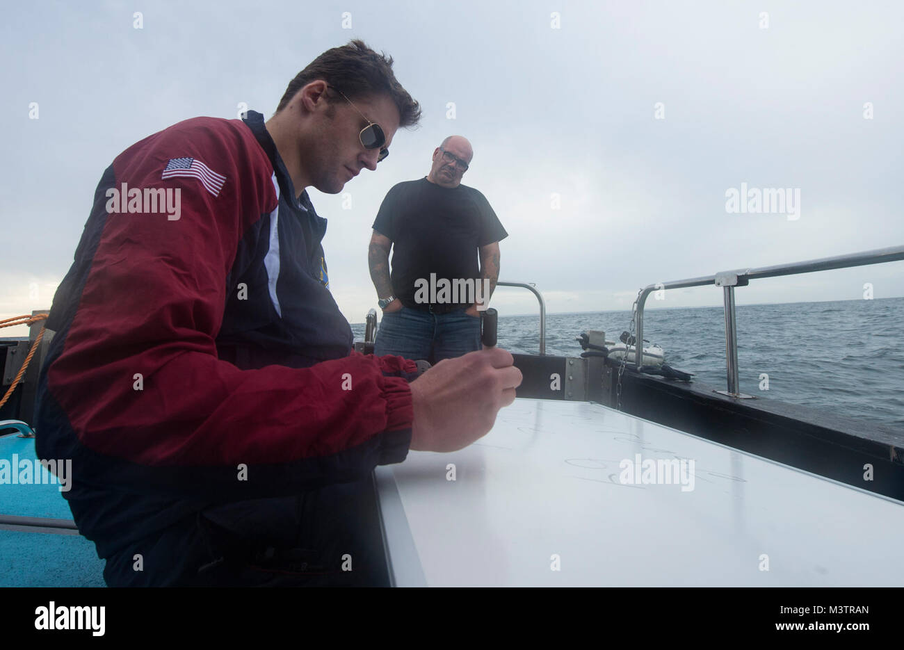 U.S. Air Force Major Simon Ritchie, a dermatologist with the 59th ...