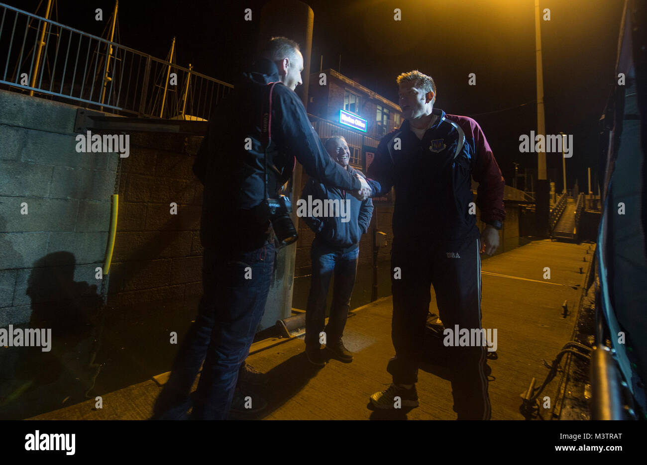 Mr. Glenn Wilson (left), an Australian swimmer, congratulates U.S. Air ...