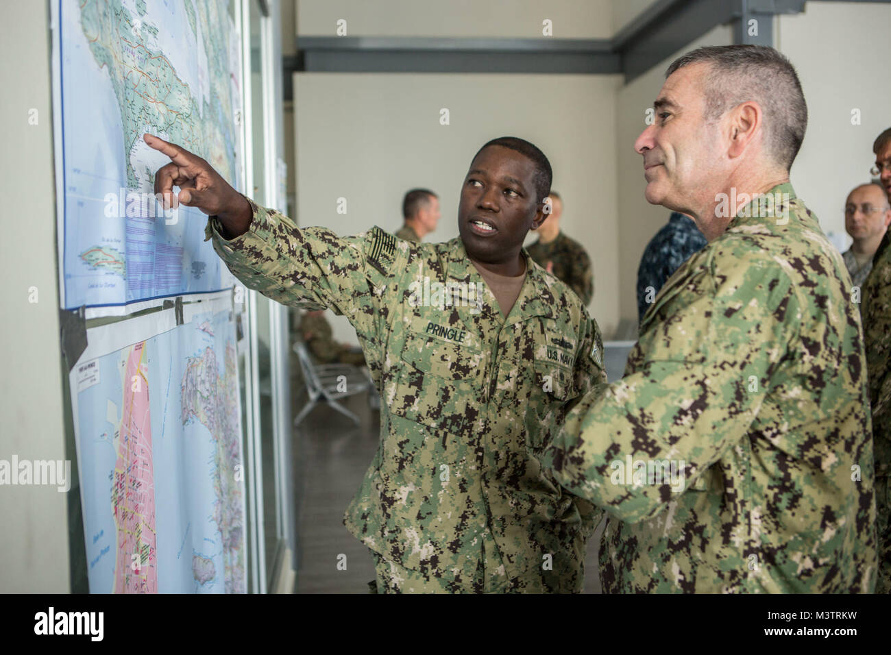 U.S. Navy Rear Adm. Cedric Pringle, left, commander of Joint Task Force ...