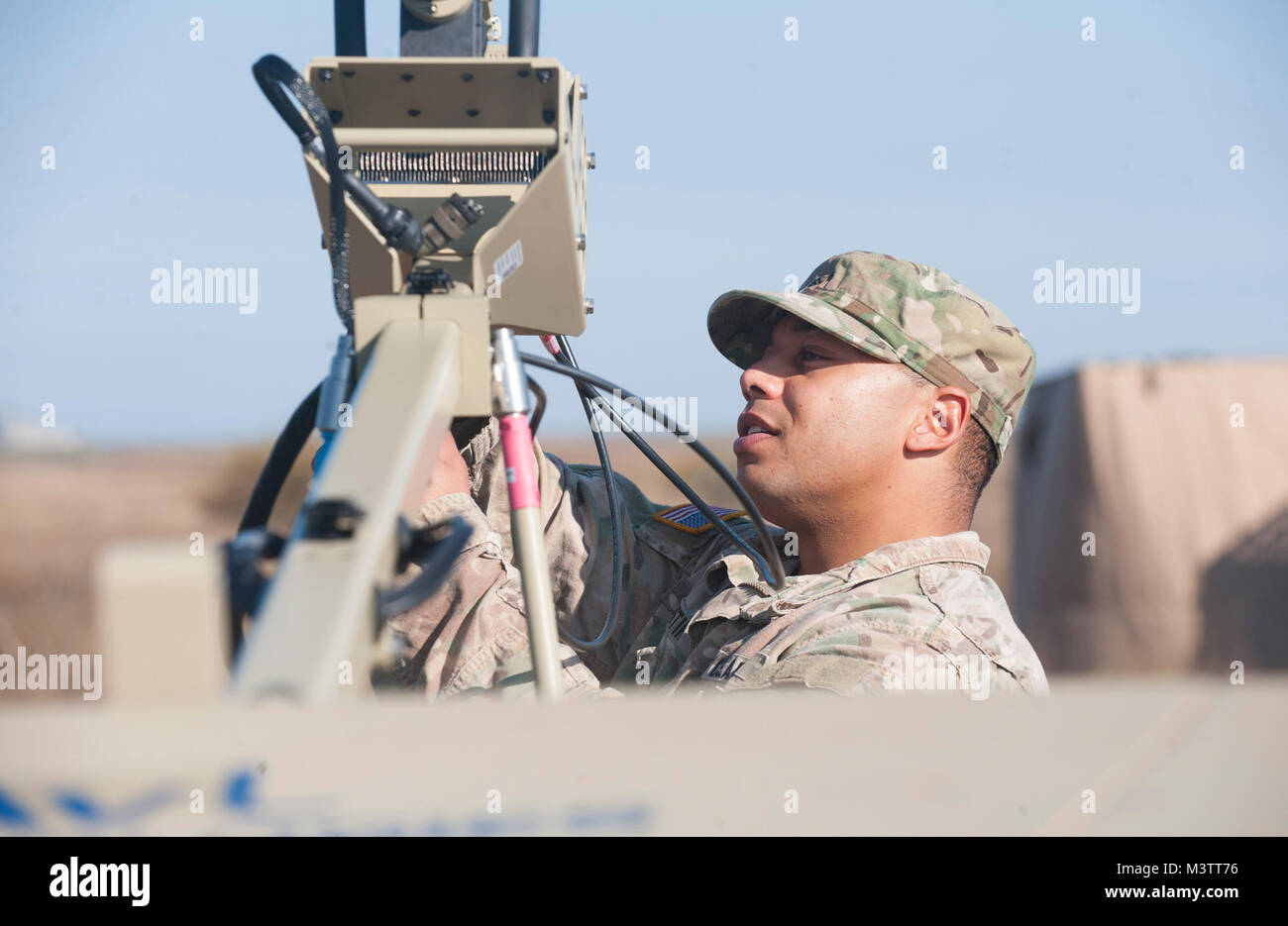 U.S. Army Sergeant Andrew Austin, with the 44th Expeditionary Signal ...