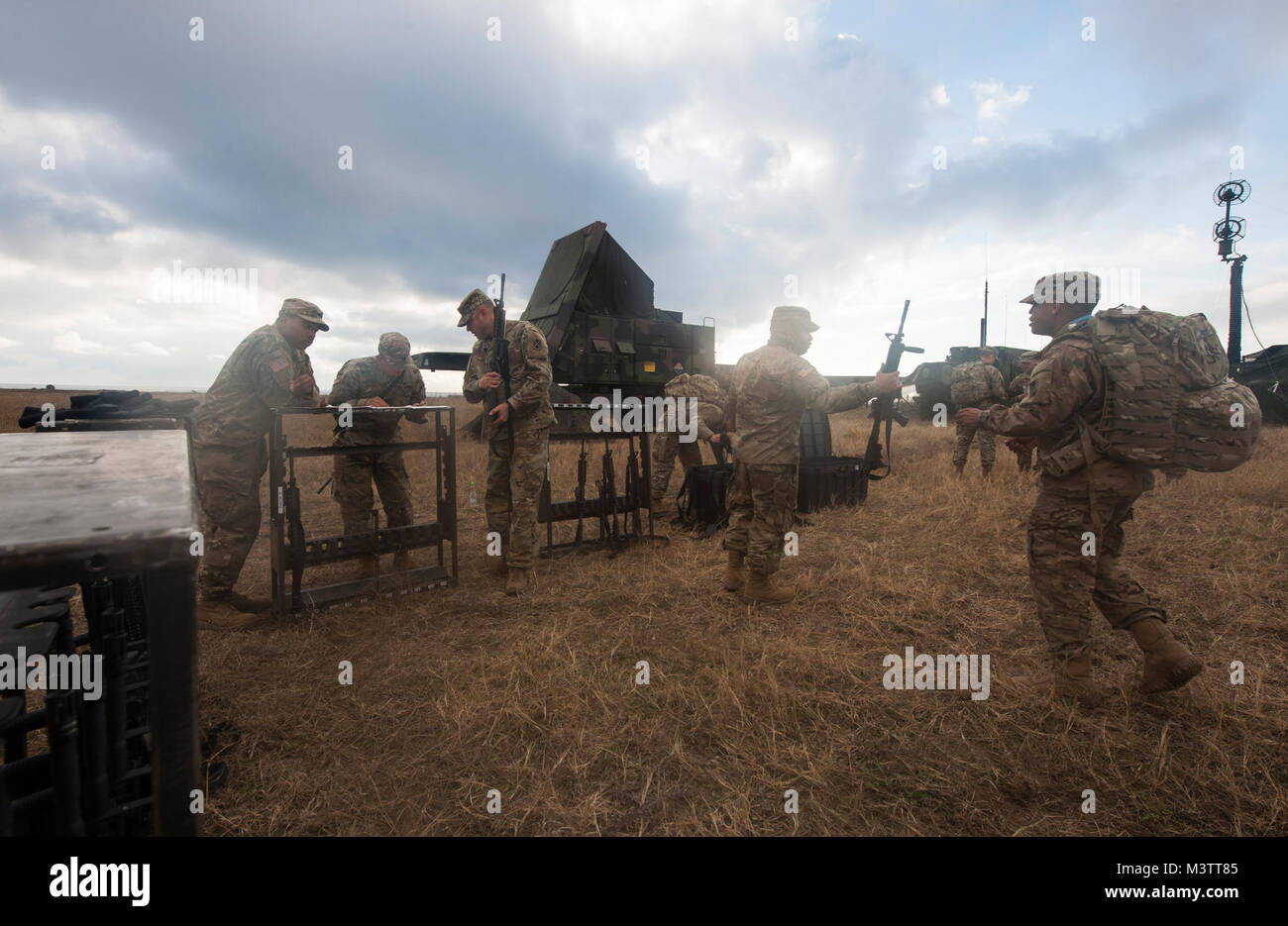Soldiers with the 5th Battalion 7th Air Defense Artillery Regiment get ...