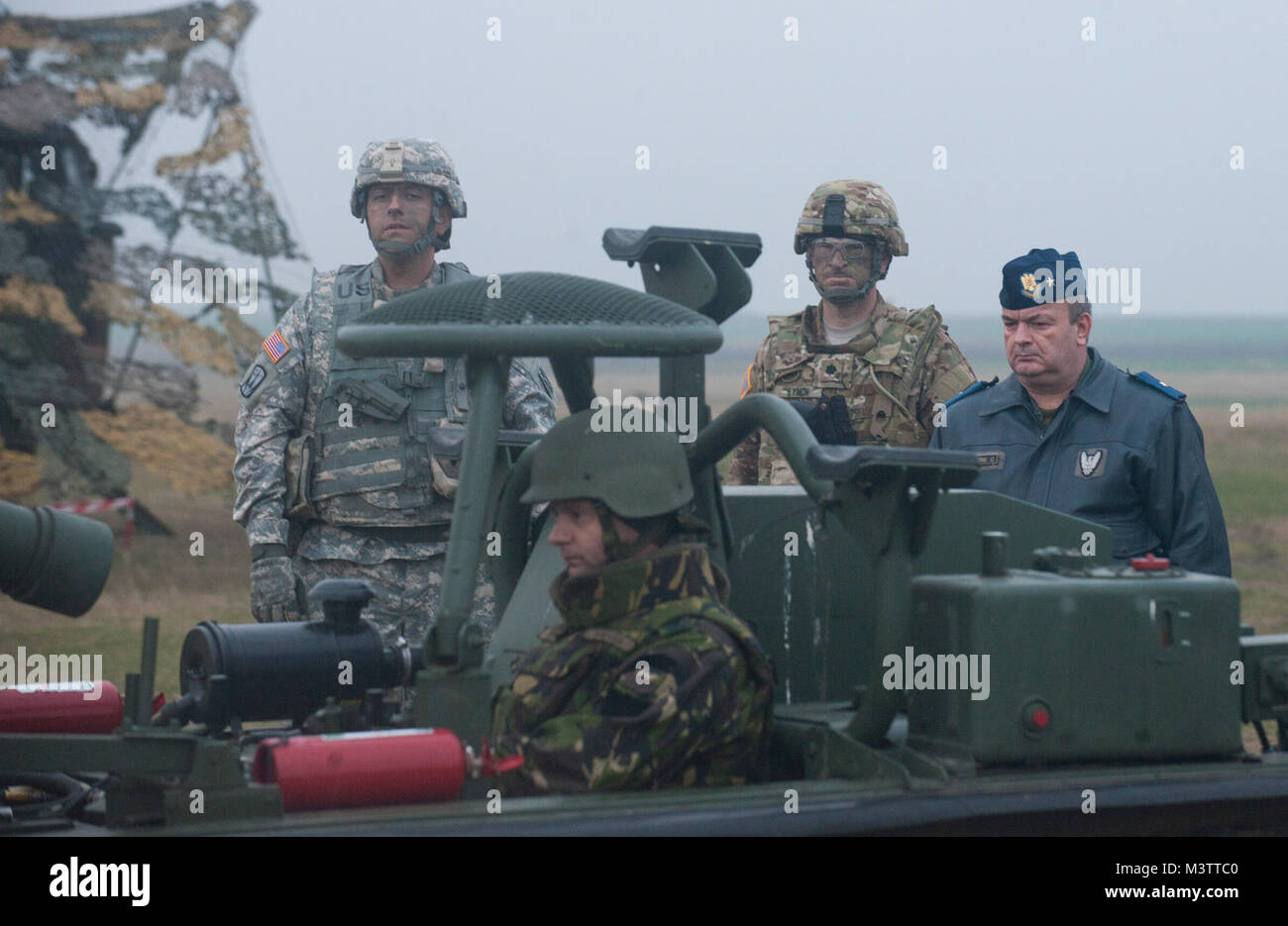 U.S. Army Lt. Col. Douglas Lynch (center), Commander 10th Army Air ...