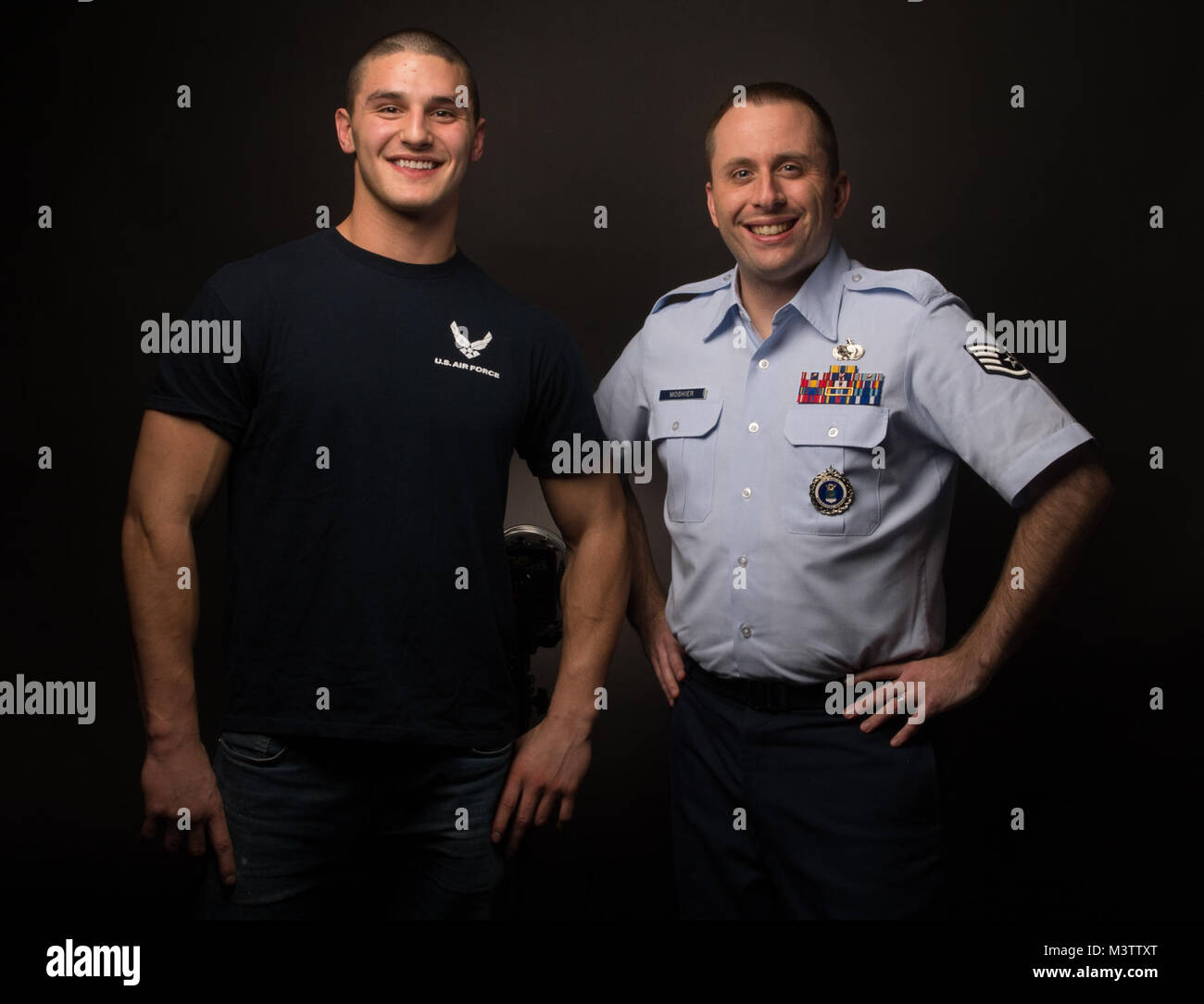 U.S. Air Force recruit, Steven Hartle, stands with his recruiter Staff ...