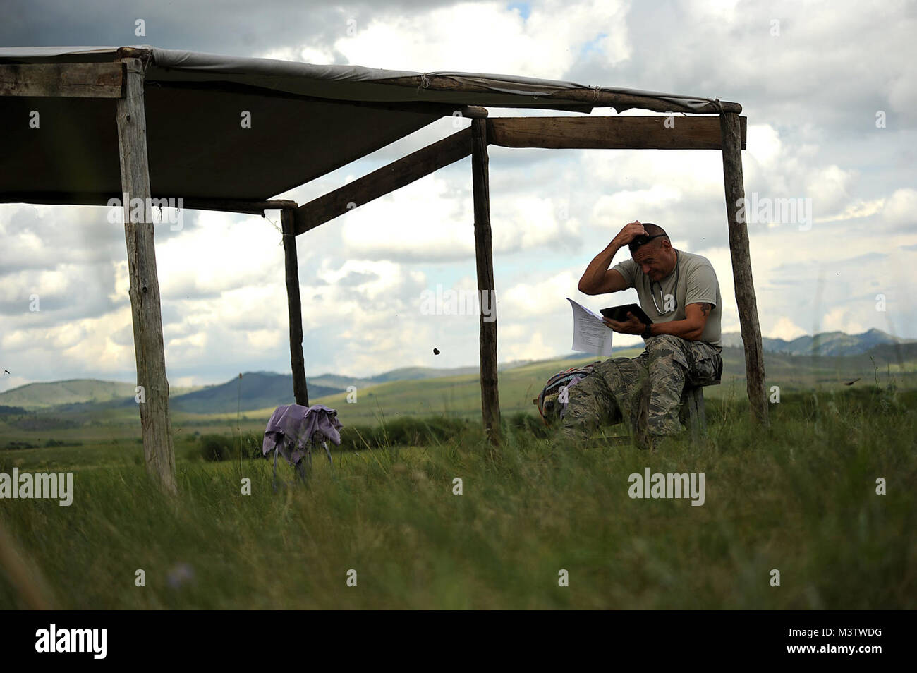 Lt. Col. Douglas Riley, a 13th AF/SGK international health specialist ...