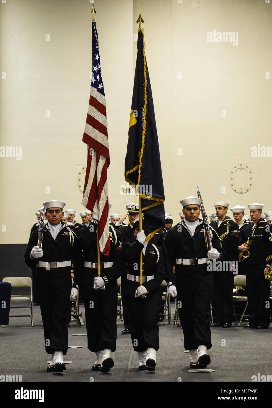 NAVAL BASE KITSAP-BREMERTON, Wash. (Jan. 12, 2017) – Sailors parade the ...
