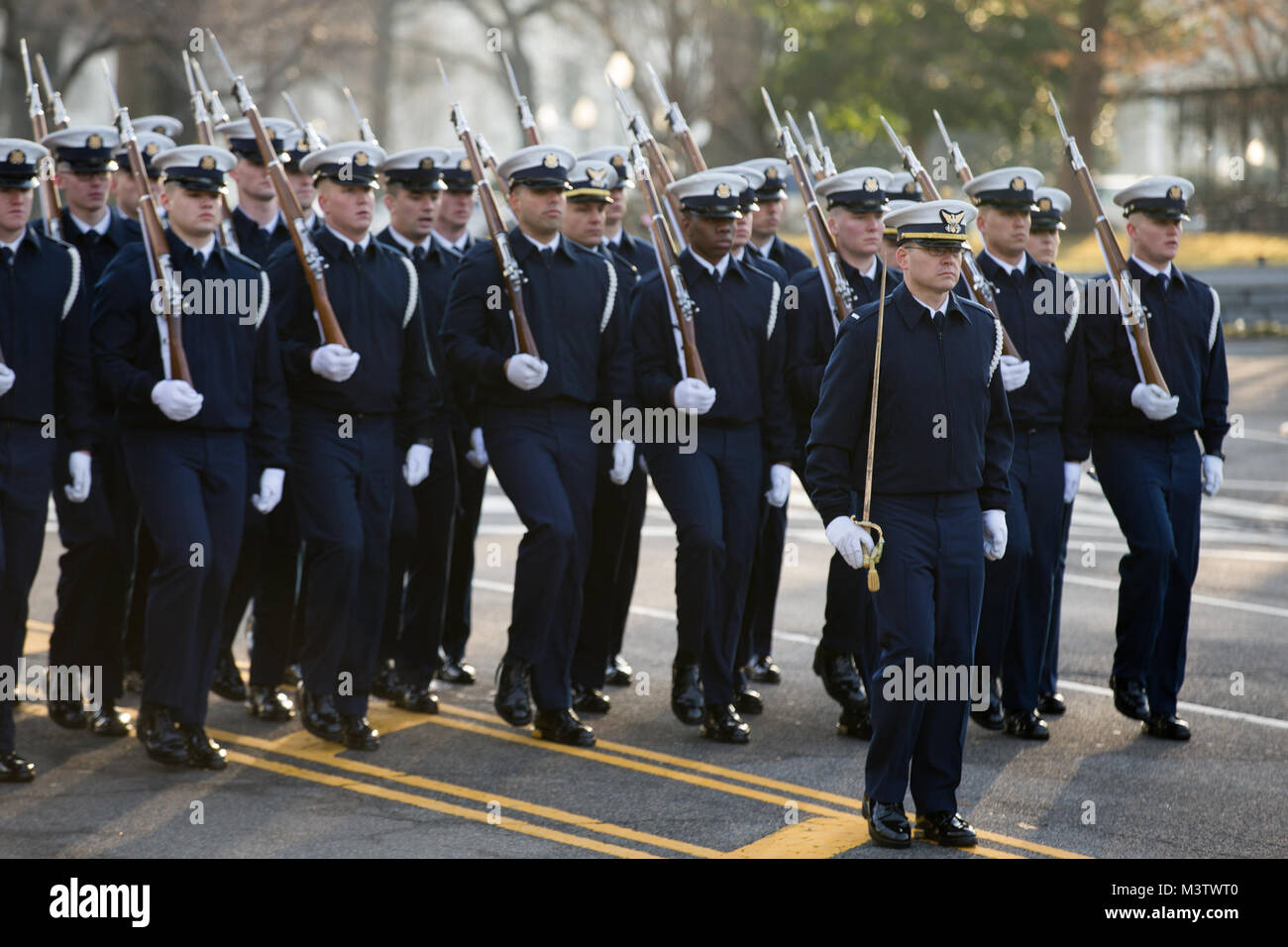 Members of the U.S. Coast Guard Ceremonial Honor Guard march in the ...