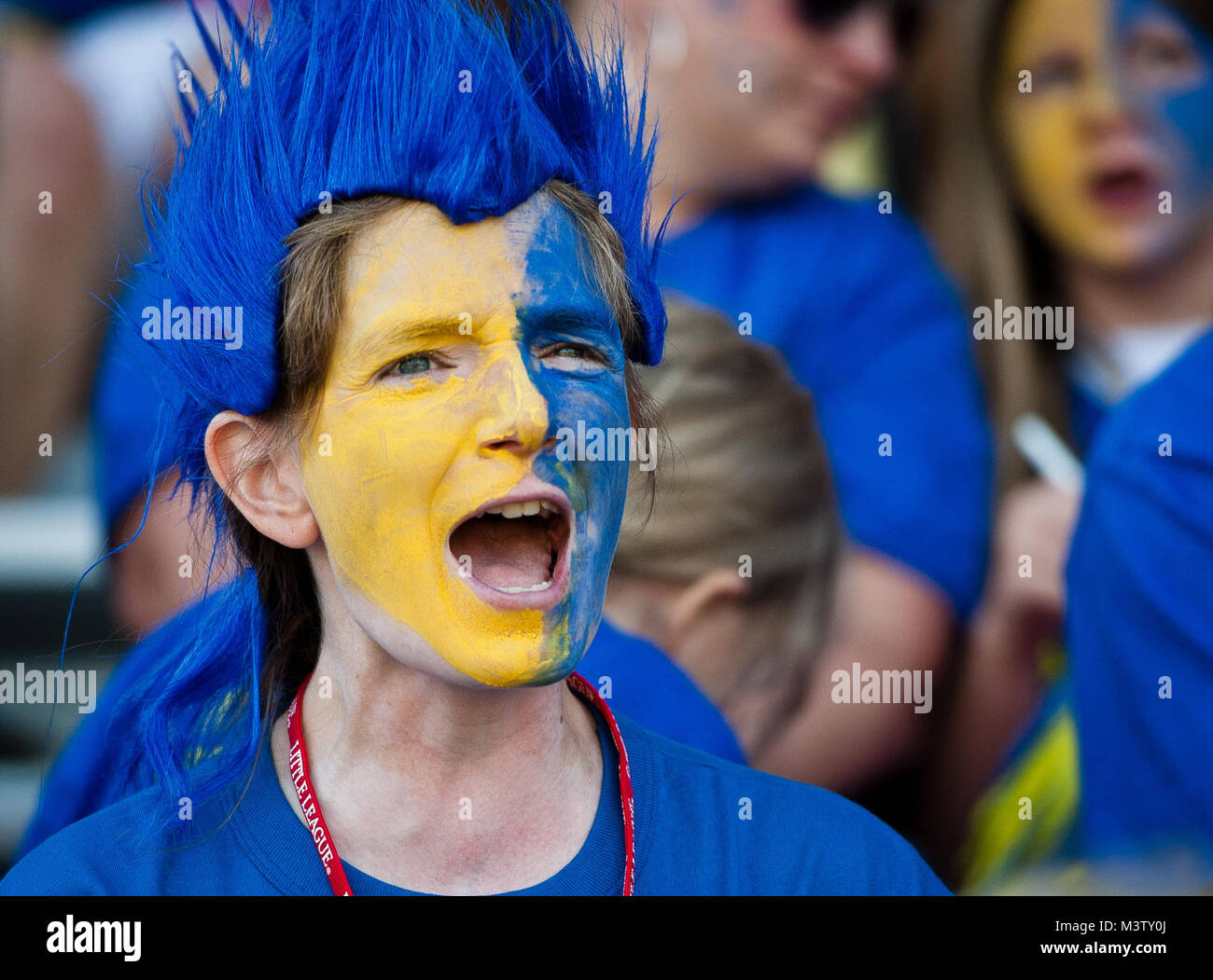Senior Master Sgt. Betsi Keltz cheers for her son Levi as he goes up to ...