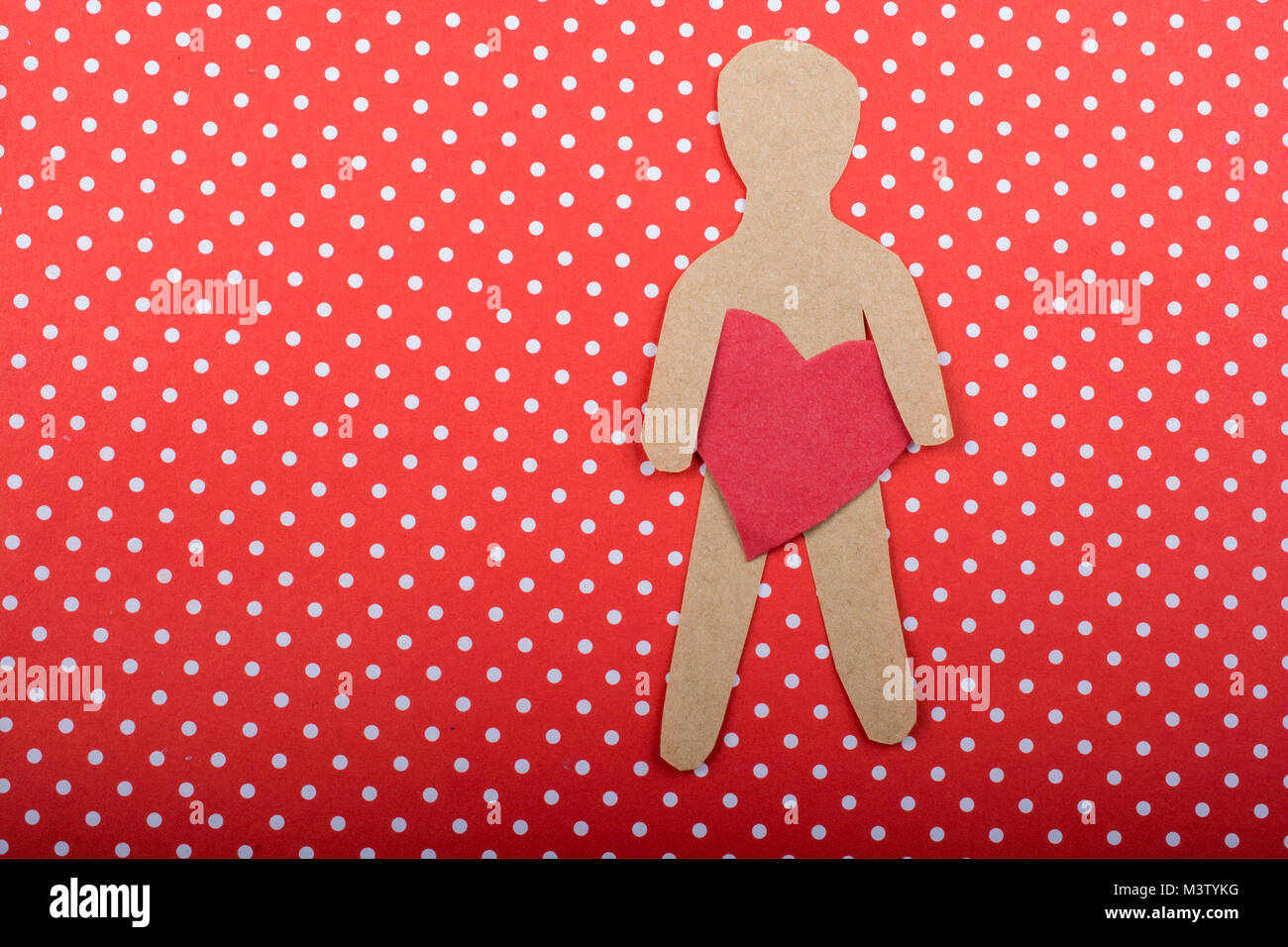 Valentine's day wording on torn paper as Love concept Stock Photo - Alamy