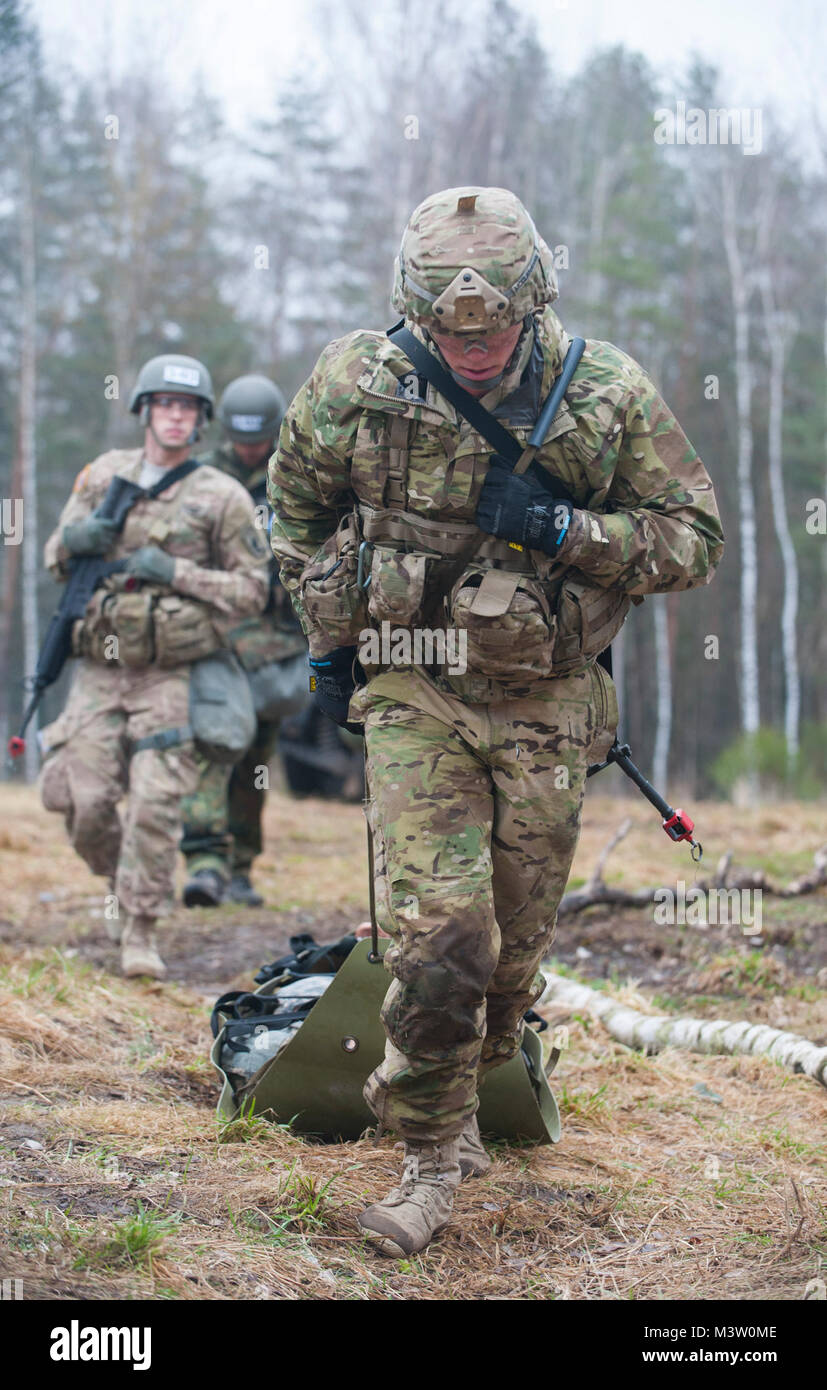 GRAFENWOEHR, Germany – U.S. Army Sergeant McClanahan pulls a military ...