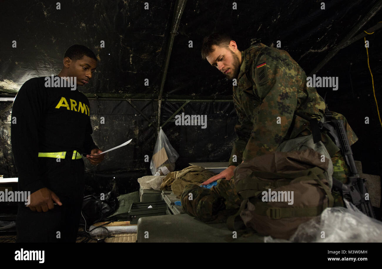 GRAFENWOEHR, Germany – U.S. Army Specialist Carlton Mazyck (left ...