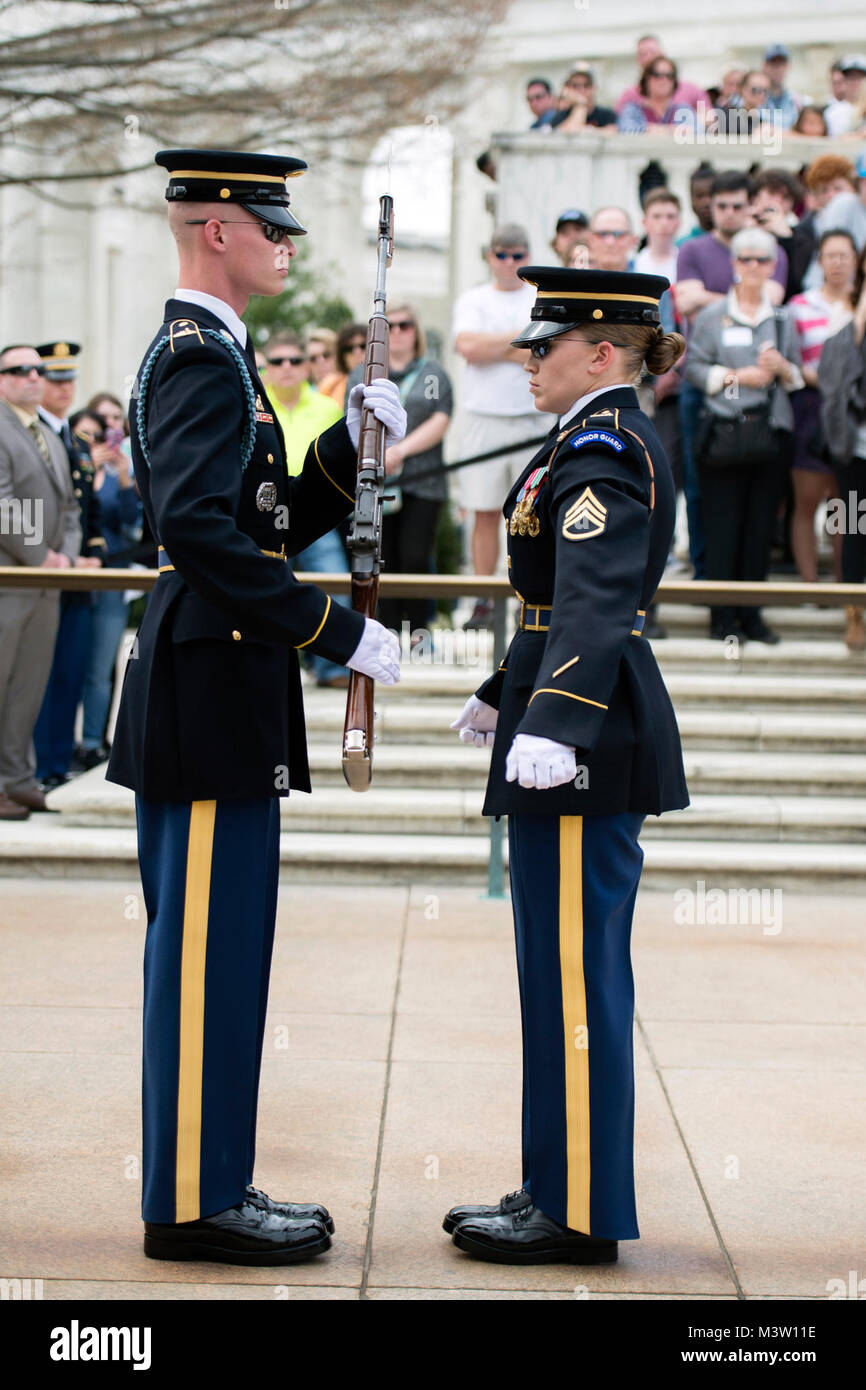 Sergeant of the Guard Staff Sgt. Ruth Hanks, right, inspects a guard ...